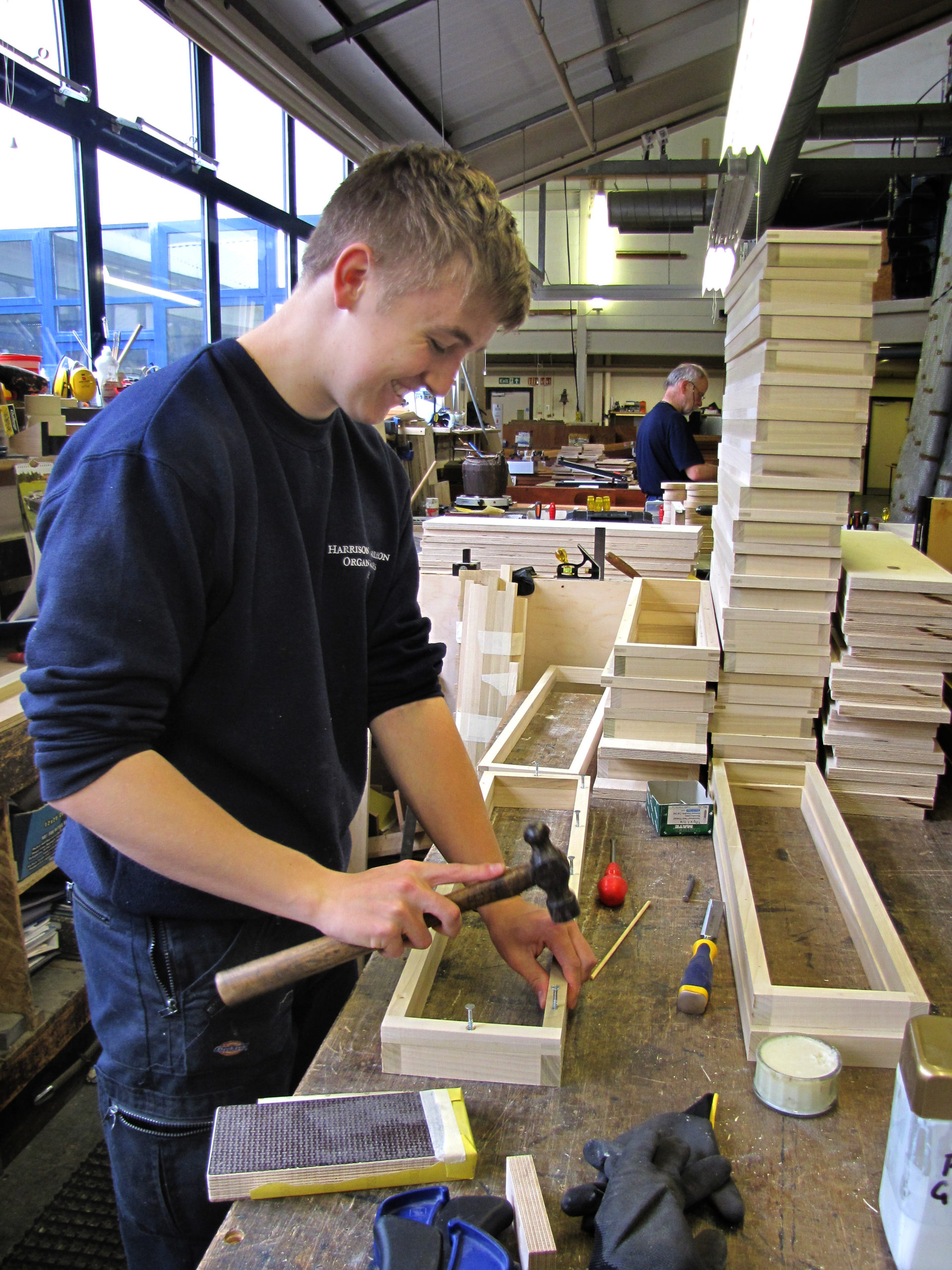 Apprentice making flappers – Harrison & Harrison Ltd